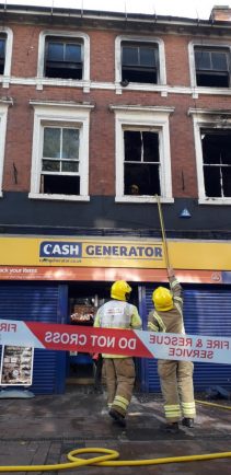 Fire rips through flats at Cash Generator on Evesham Walk in Redditch ...
